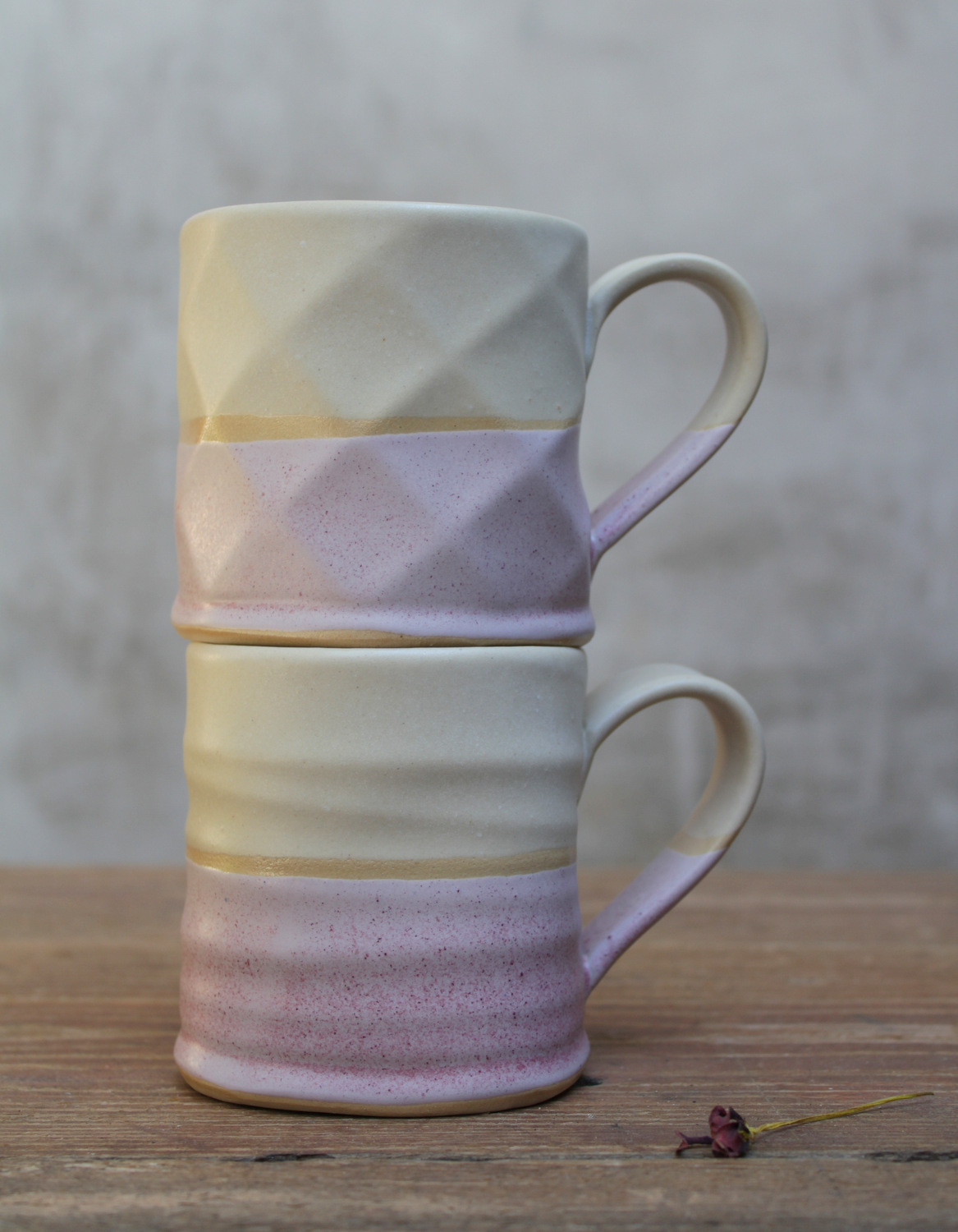 smooth textured coffee mugs in pink and cream for coffee lovers